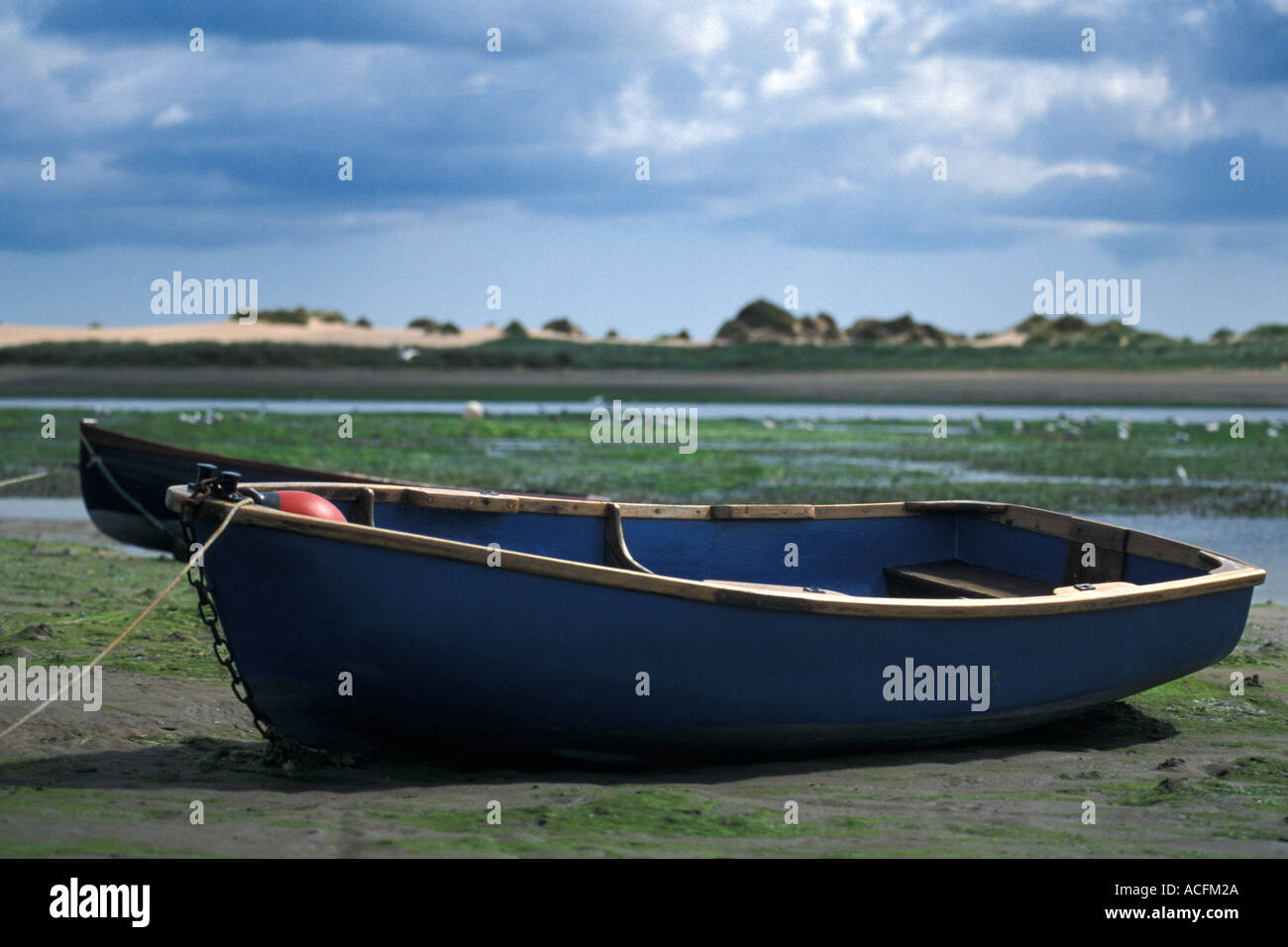Rowing boats beached by low tide on a north east Scotland estuary Stock ...