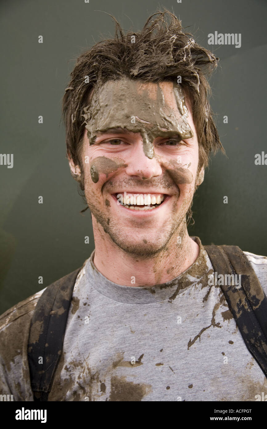 Man covered in mud at the Glastonbury music festival 2007 Stock Photo ...