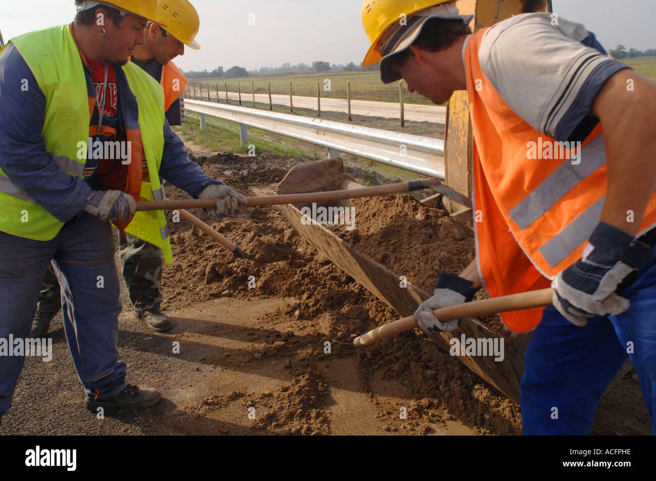 Laying road - workers constructing the M5 toll motorway in Hungary ...
