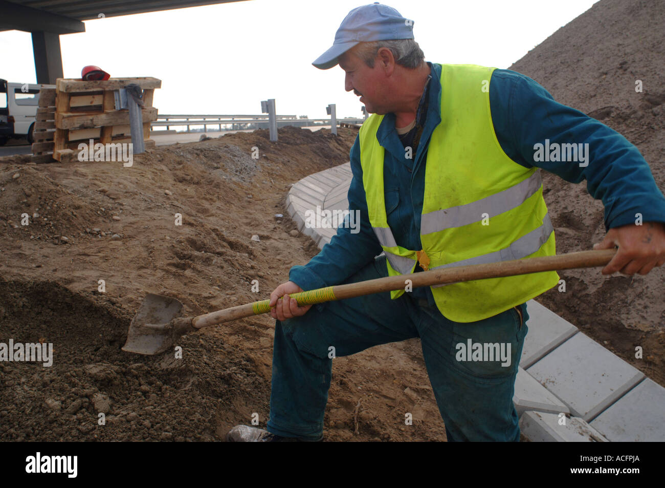 Laying road - workers constructing the M5 toll motorway in Hungary ...