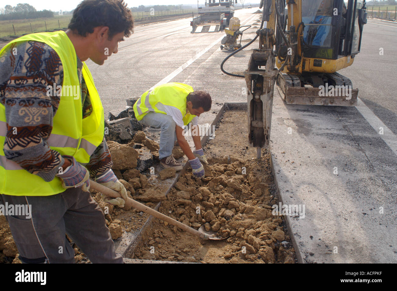 Laying road - workers constructing the M5 toll motorway in Hungary ...
