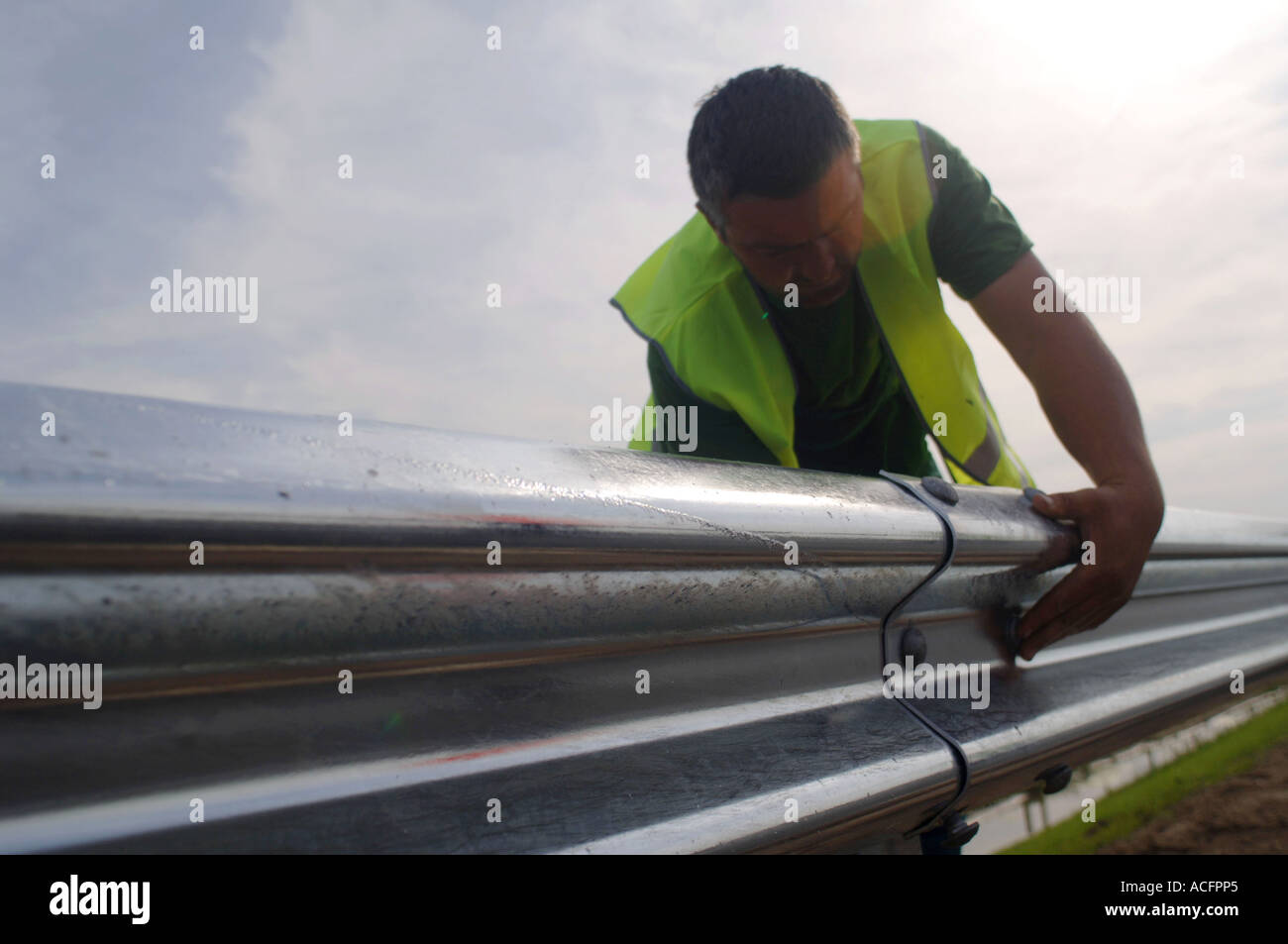 Laying road - workers constructing the M5 toll motorway in Hungary ...