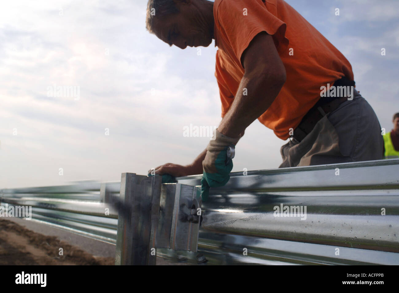 Laying road - workers constructing the M5 toll motorway in Hungary ...
