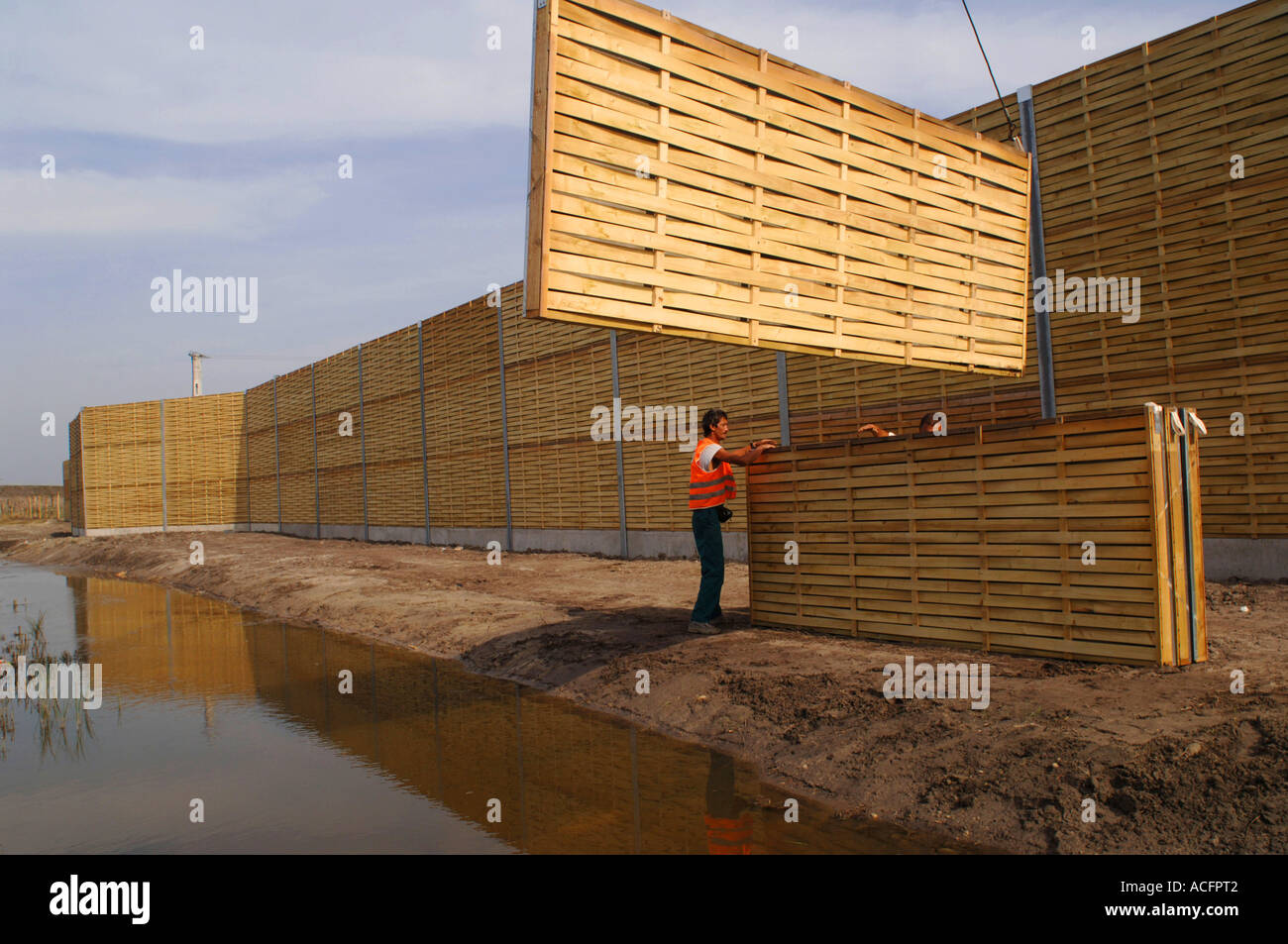 Laying road - workers constructing the M5 toll motorway in Hungary ...