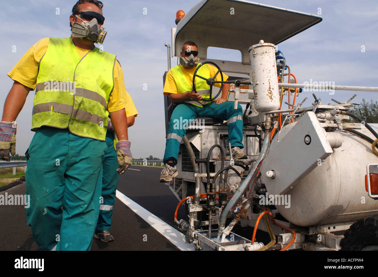 Laying road - workers constructing the M5 toll motorway in Hungary ...
