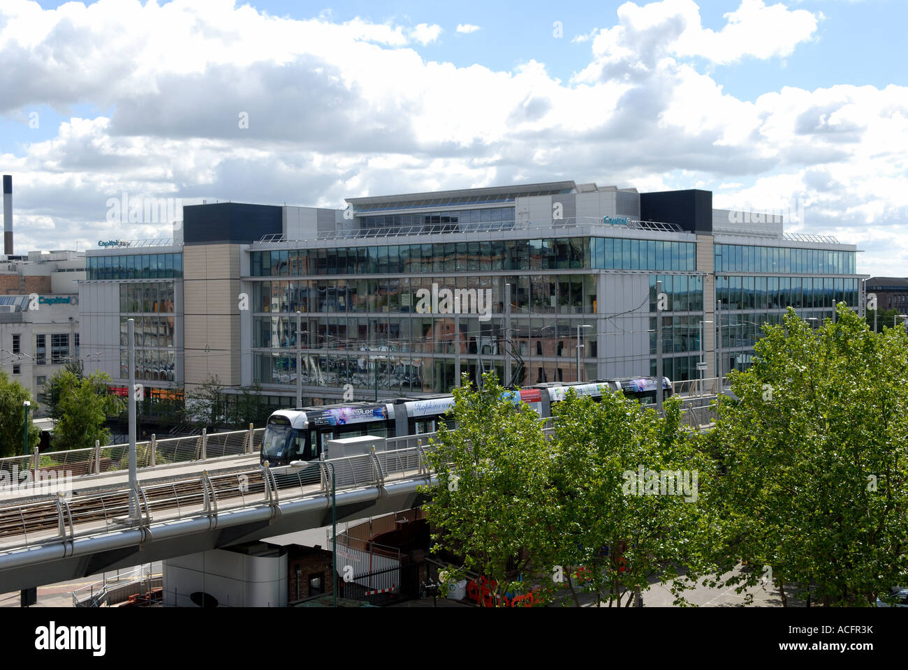 Nottingham tram passing the capital one building Stock Photo - Alamy