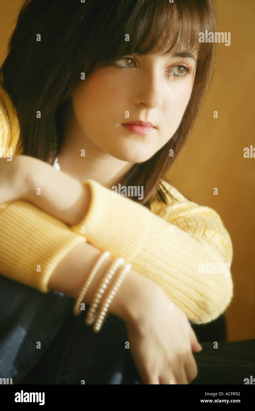 Contemplative teenage girl Stock Photo - Alamy