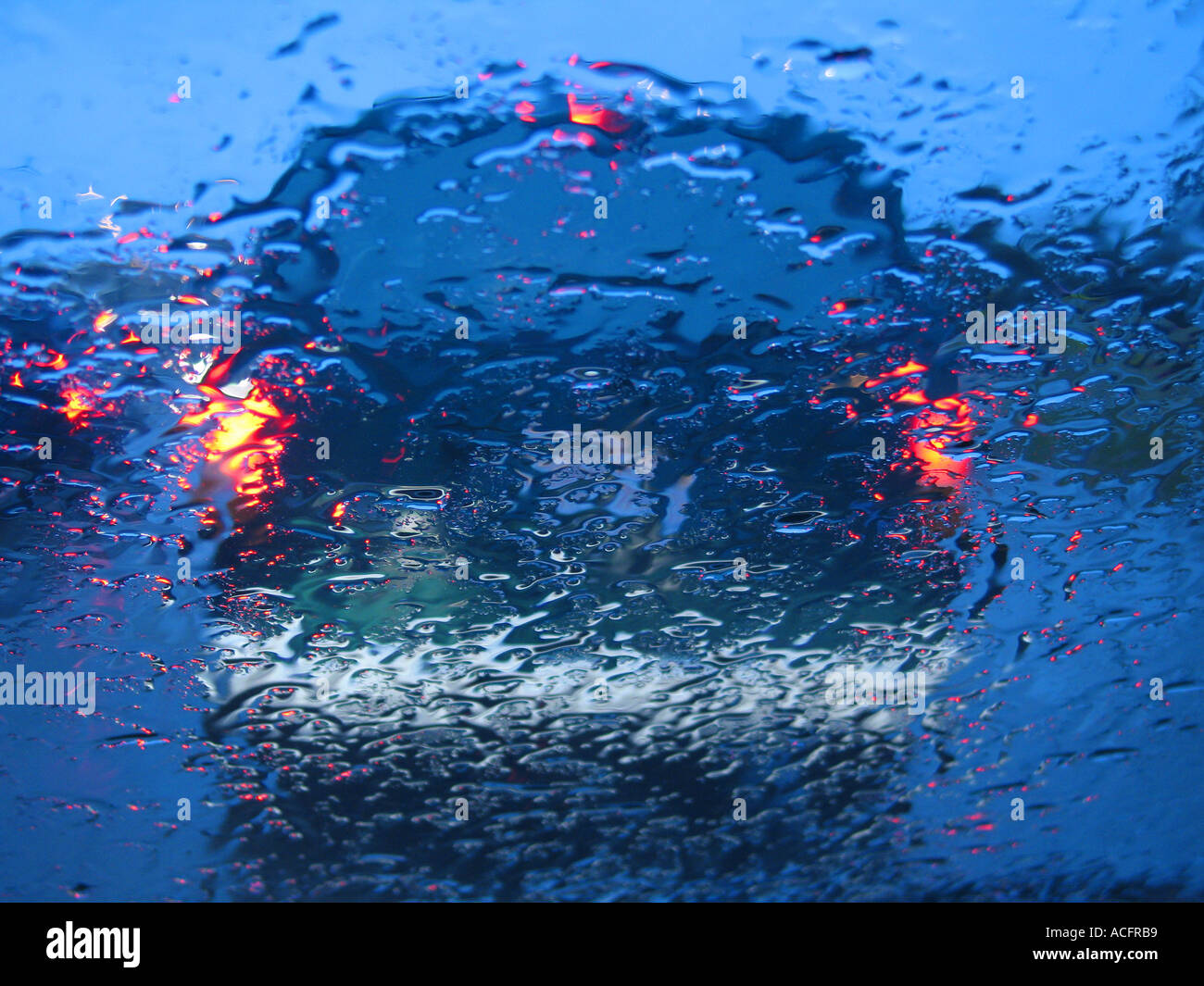 Waiting in traffic while raining Stock Photo - Alamy