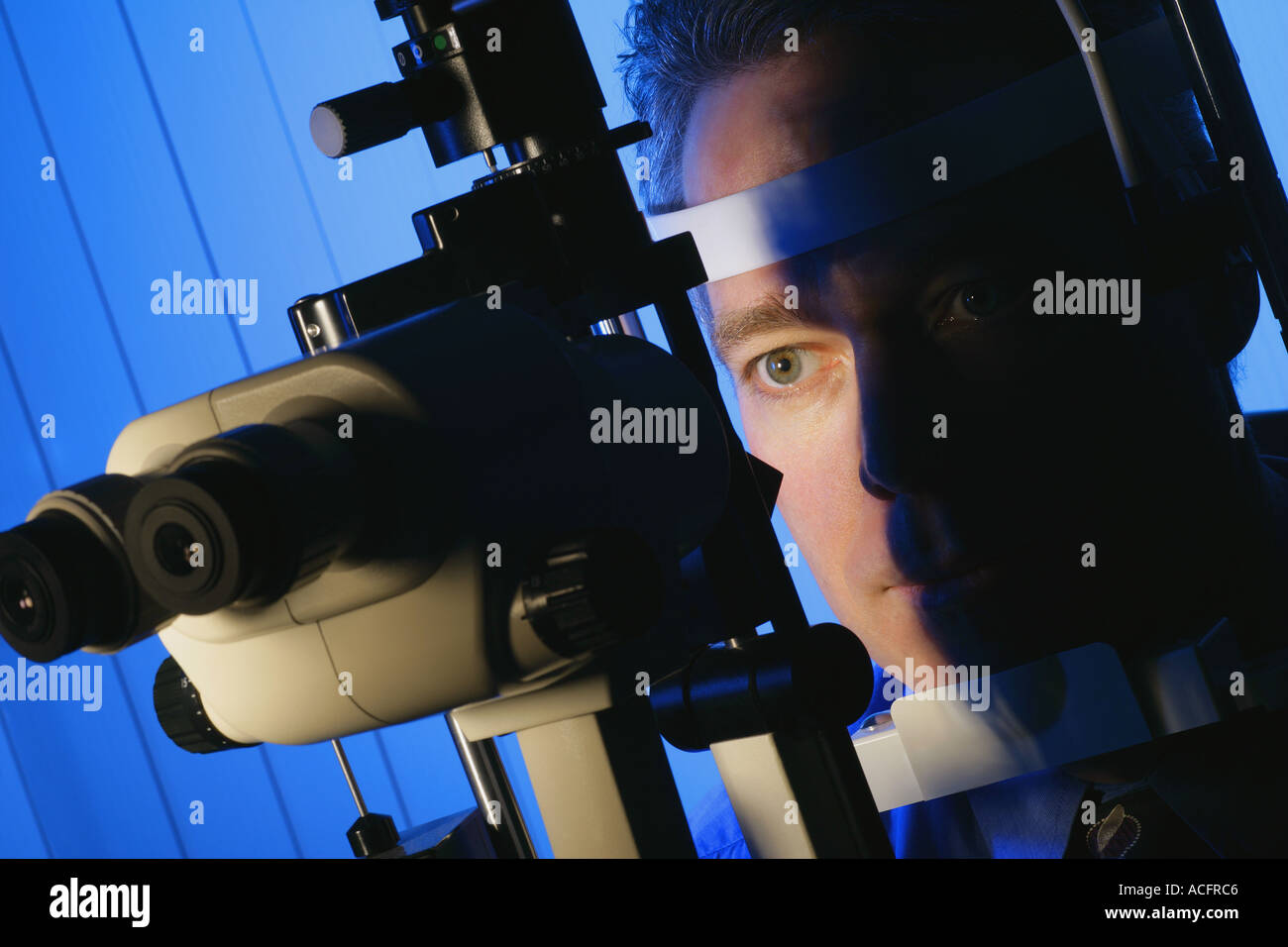 Man having eye test Stock Photo - Alamy
