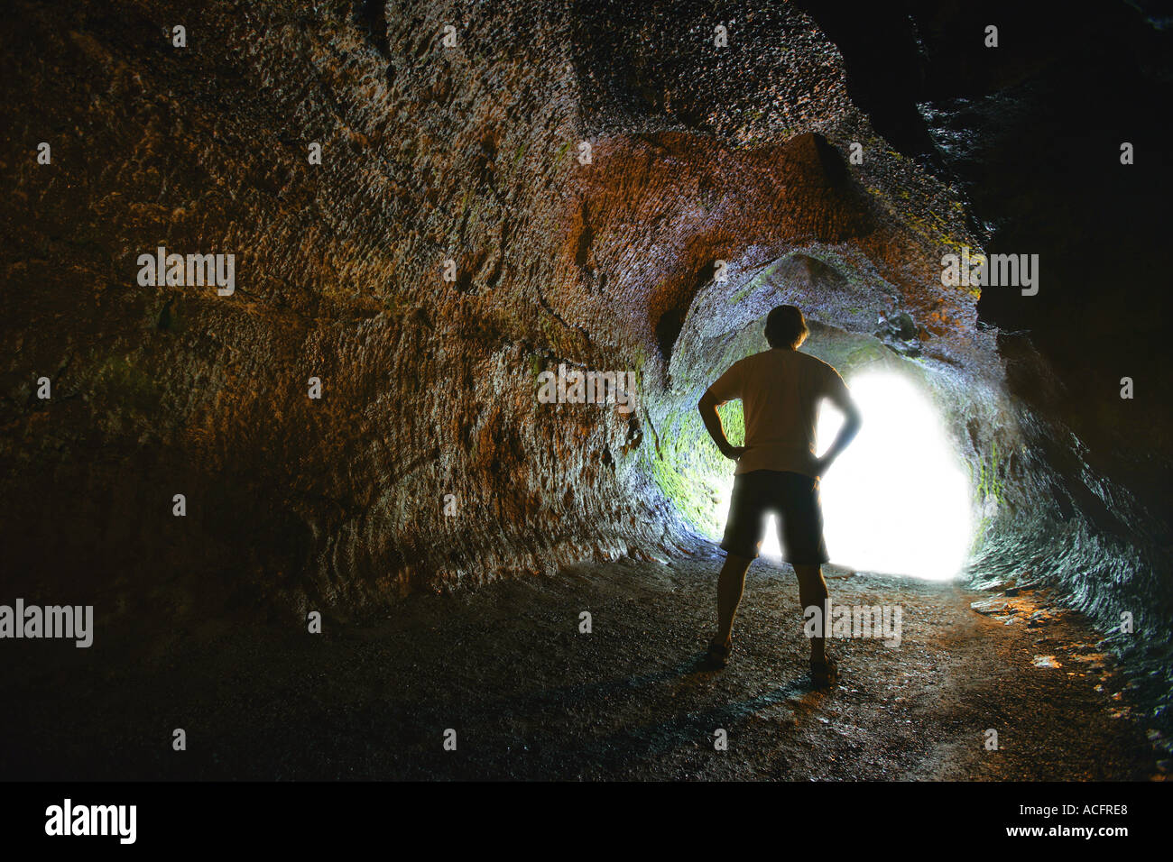 Man inside tunnel Stock Photo - Alamy