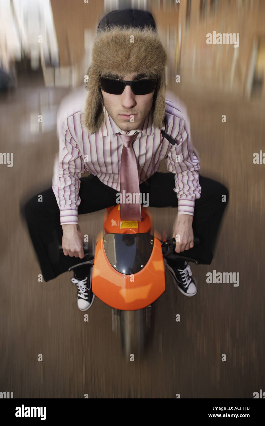 Big man on tiny bike Stock Photo - Alamy