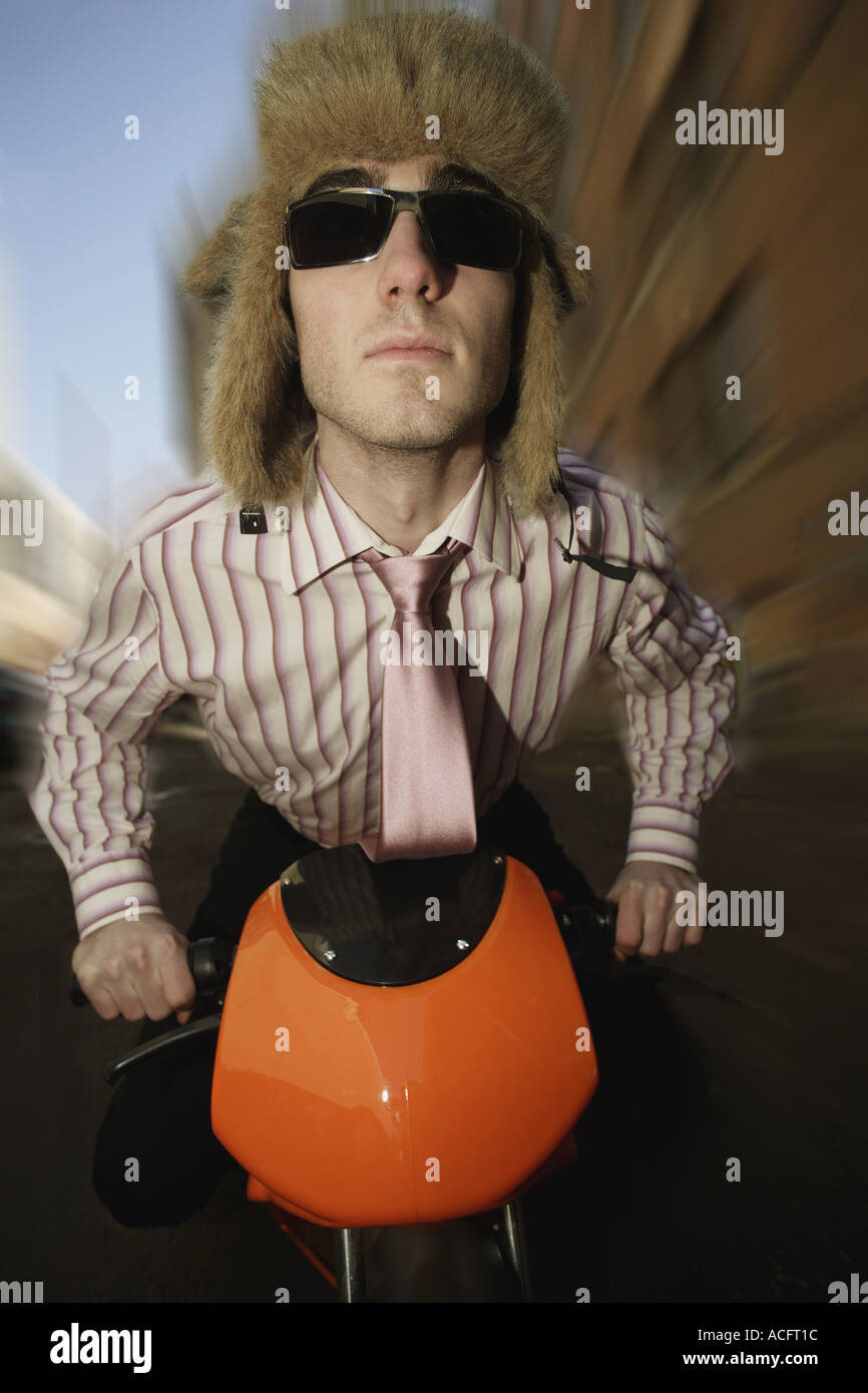 Man on mini bike funny hi-res stock photography and images - Alamy