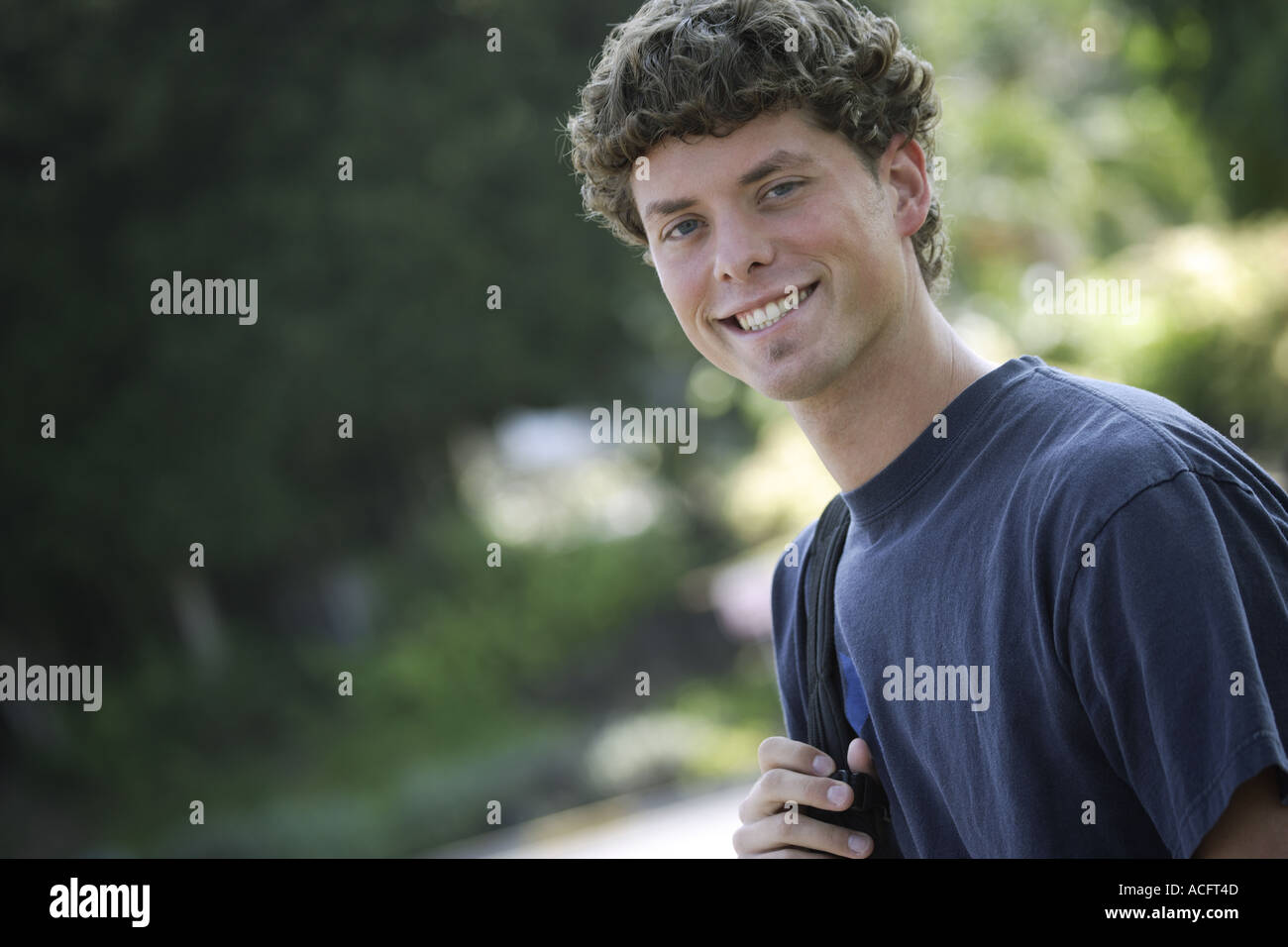 Smiling teen male outdoor hi-res stock photography and images - Alamy