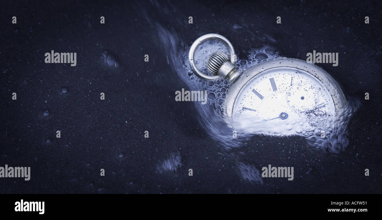 Watch being swept away by water Stock Photo - Alamy