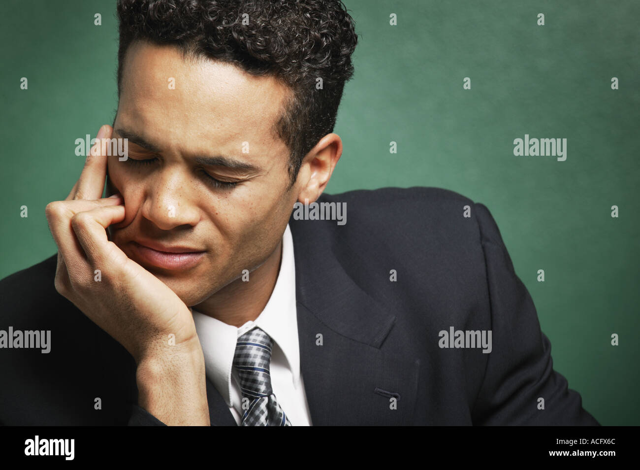 Portrait of pained businessman Stock Photo - Alamy