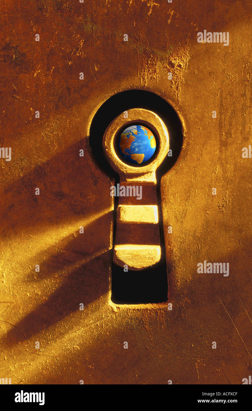 Globe inside a keyhole Stock Photo - Alamy