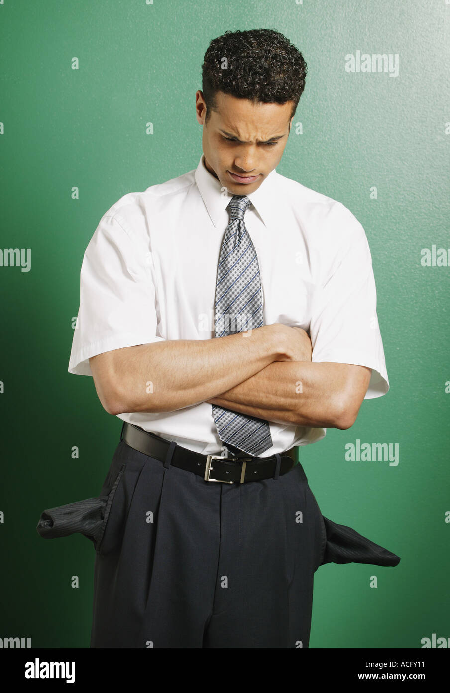 Man with empty pockets Stock Photo - Alamy