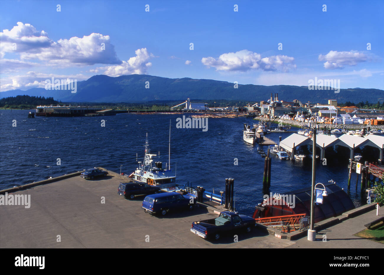 Busy waterfront and pier Stock Photo - Alamy