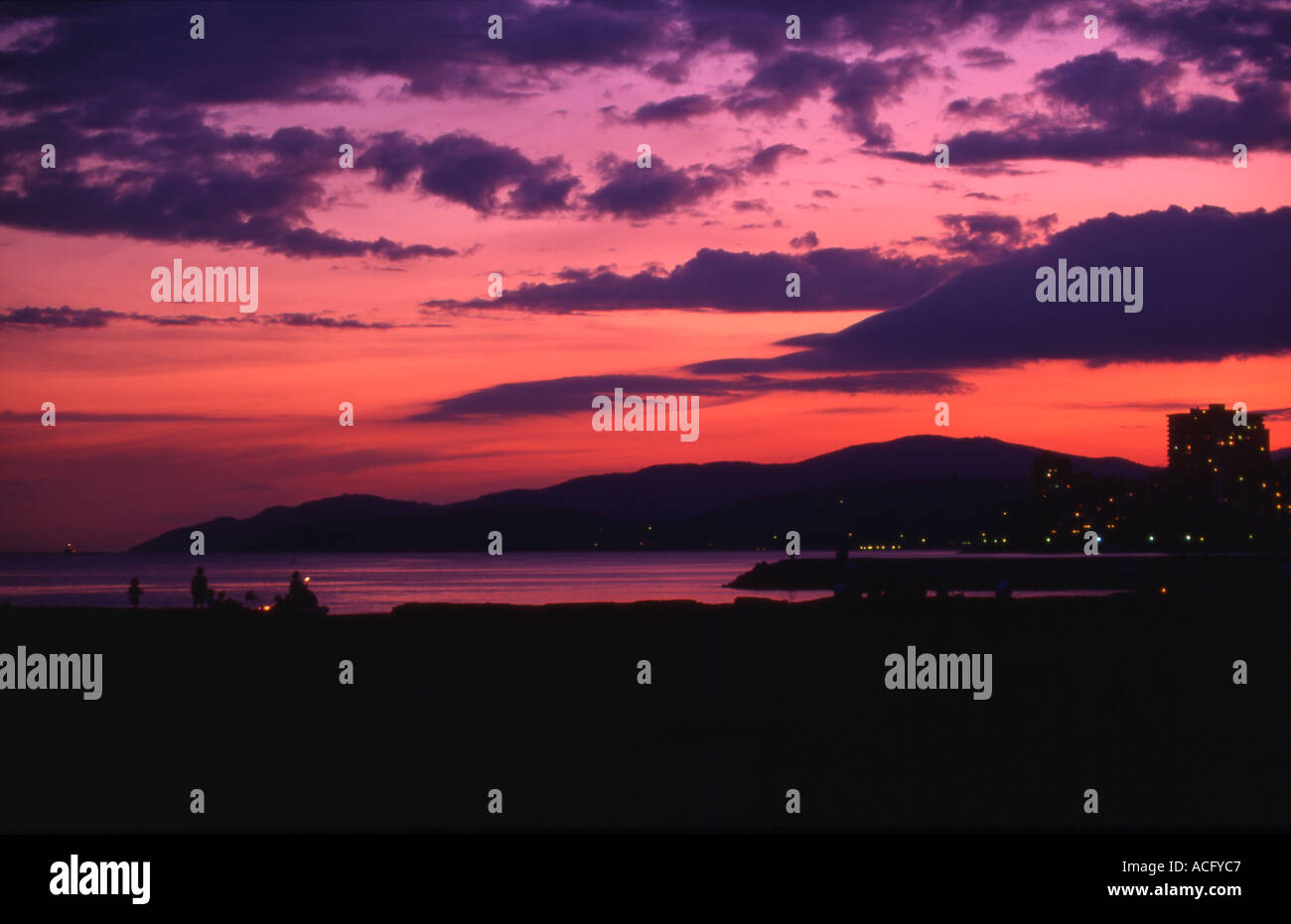 Dramatic sunset over a town Stock Photo - Alamy