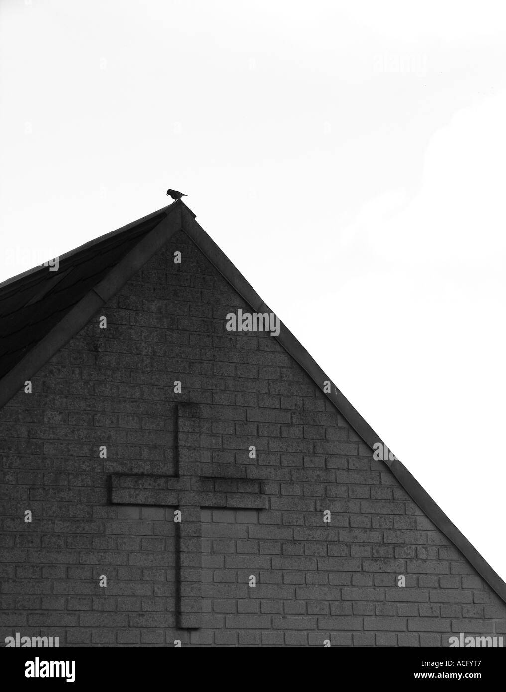 Christian cross on the wall Black and White Stock Photos & Images - Alamy