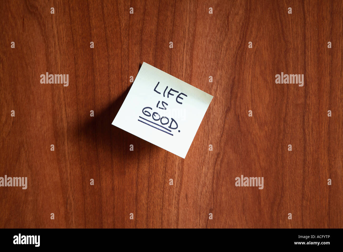 life is good motto written on a post it note memo Stock Photo - Alamy