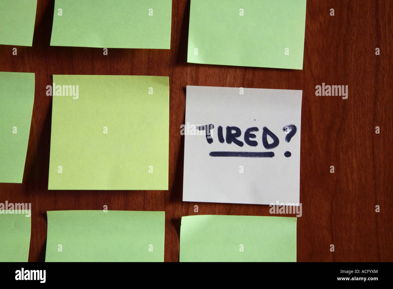 tired ? written on post it note memo Stock Photo - Alamy