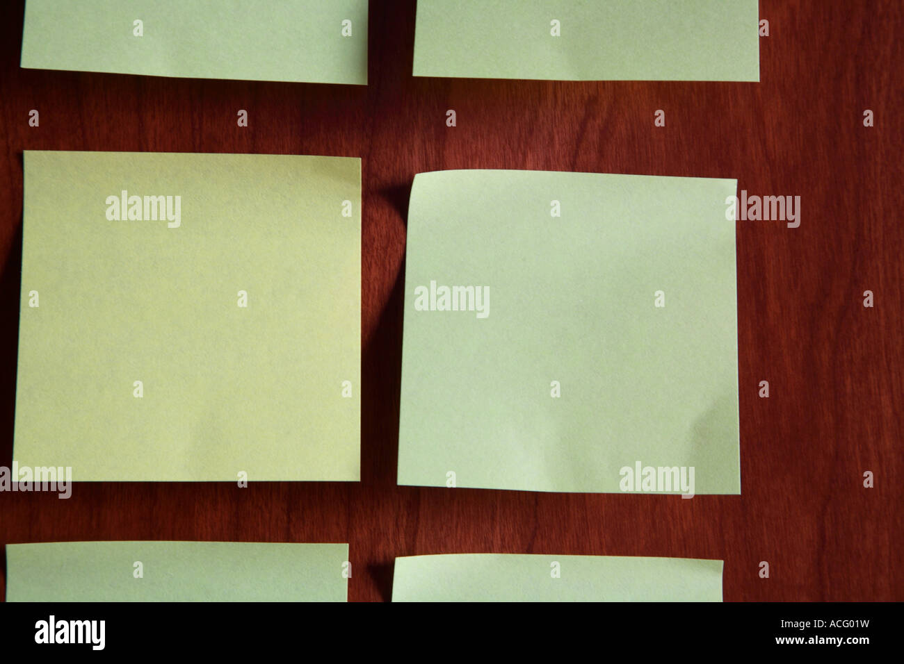 series of blank post it note hanged on a wall Stock Photo - Alamy