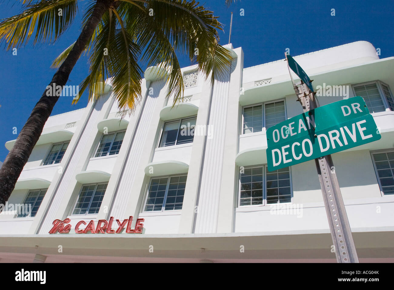 Art deco architecture of the Carlyle Hotel with Ocean Drive and Deco ...