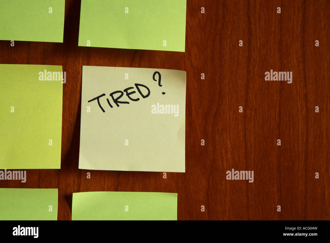 tired ? written on post it note memo Stock Photo - Alamy