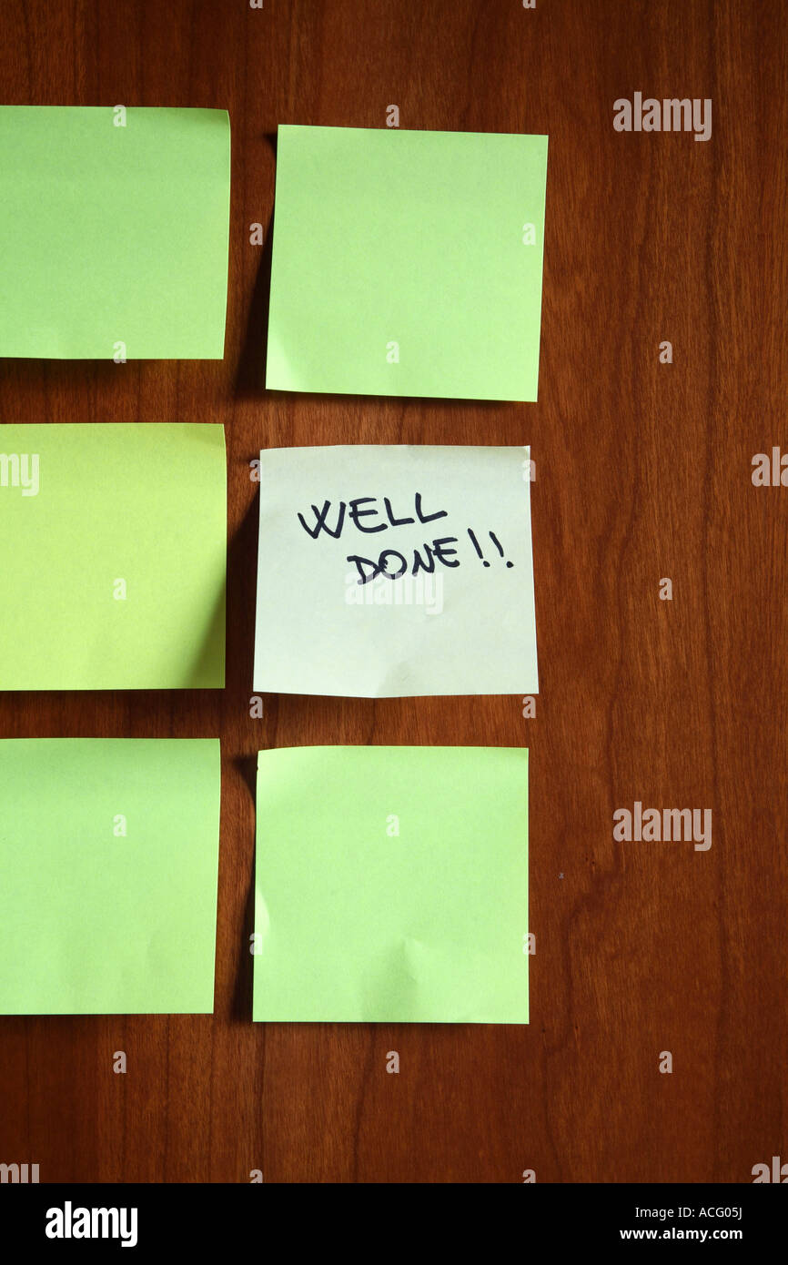 well done ! written on a post it memo note Stock Photo - Alamy