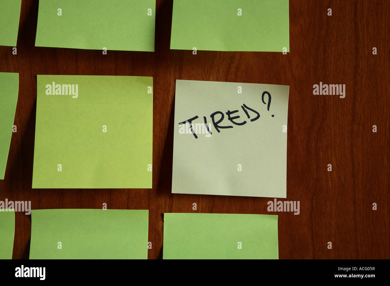 tired ? written on post it note memo Stock Photo - Alamy