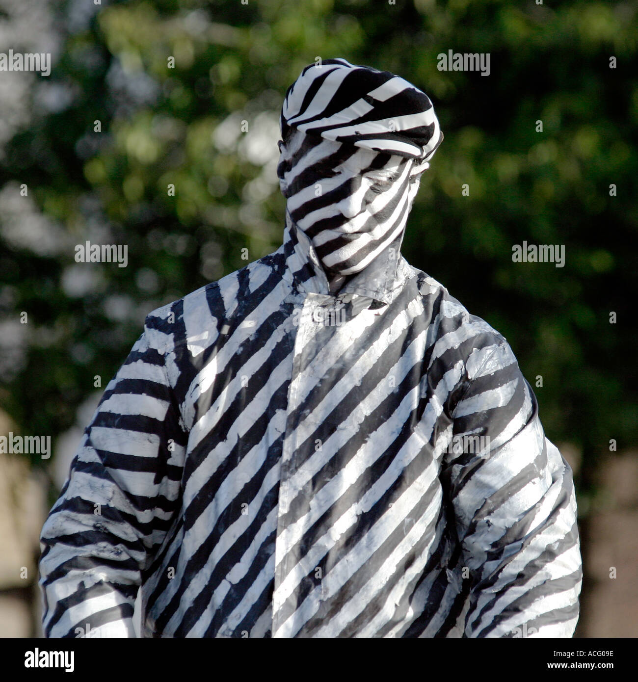 Mime painted in black and white stripes. The South Bank, London ...