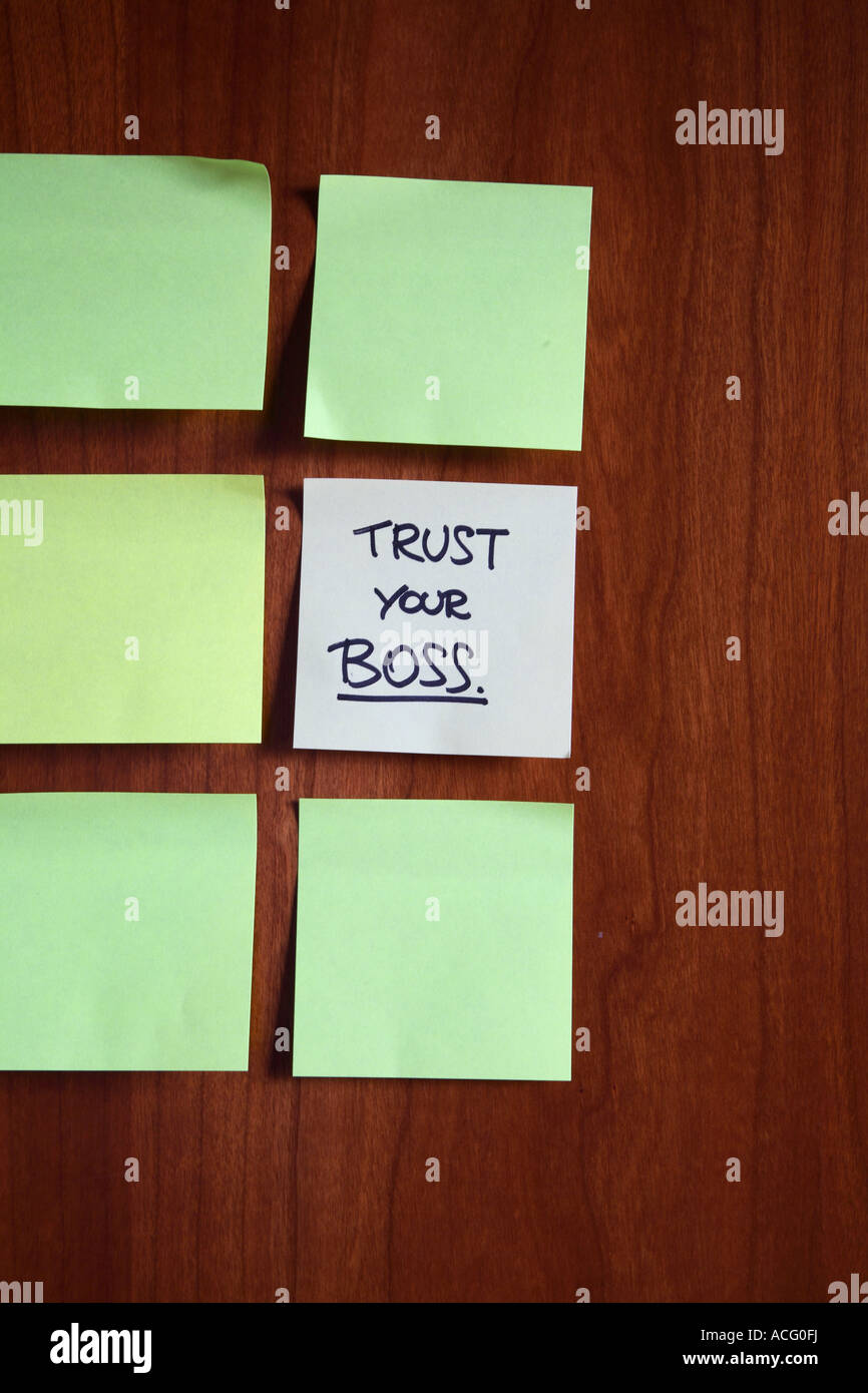 trust your boss written on post it note memo Stock Photo - Alamy