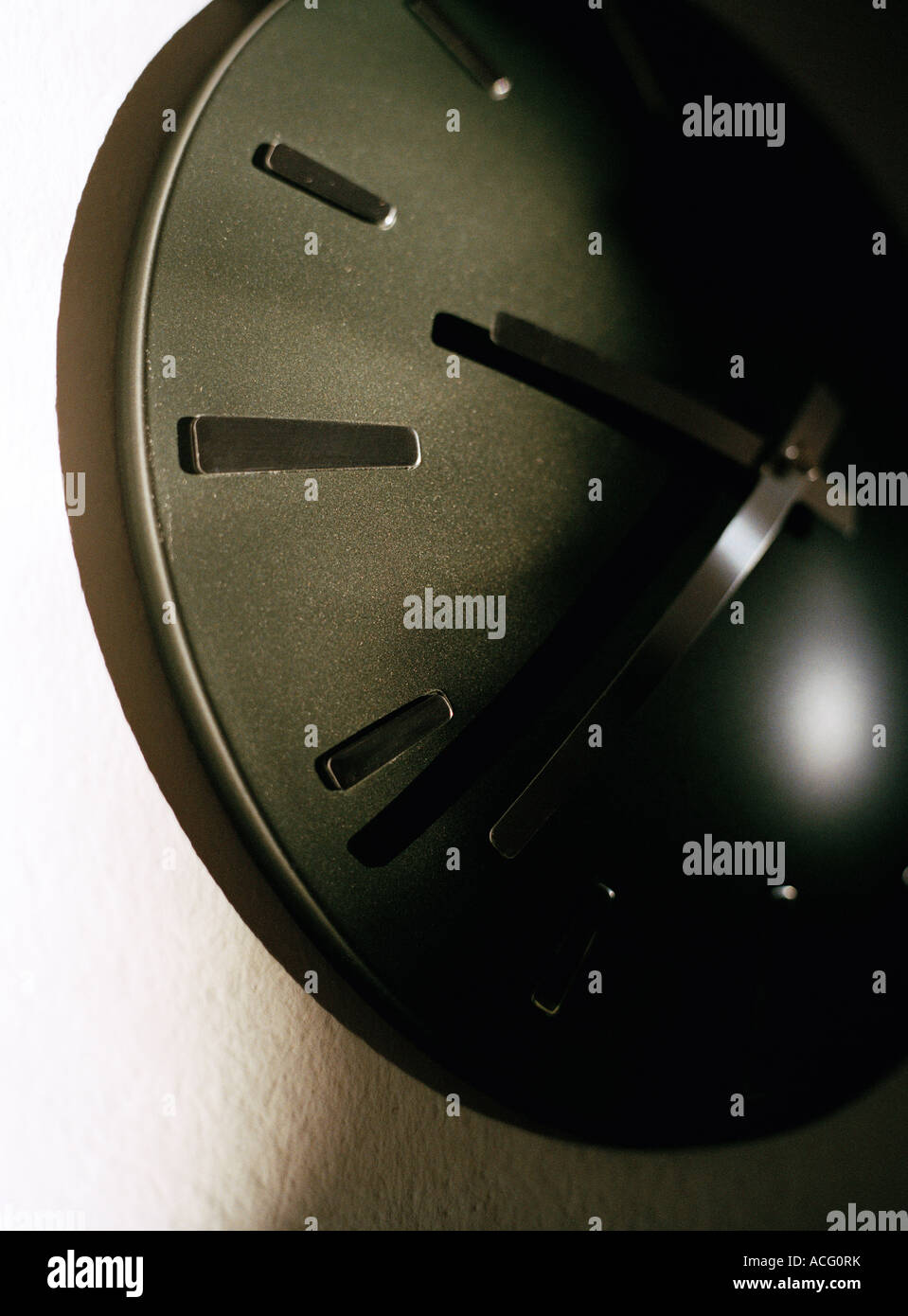 A clock on a wall Stock Photo - Alamy