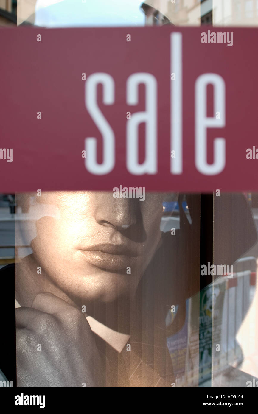 Sale sign in shop window Stock Photo - Alamy