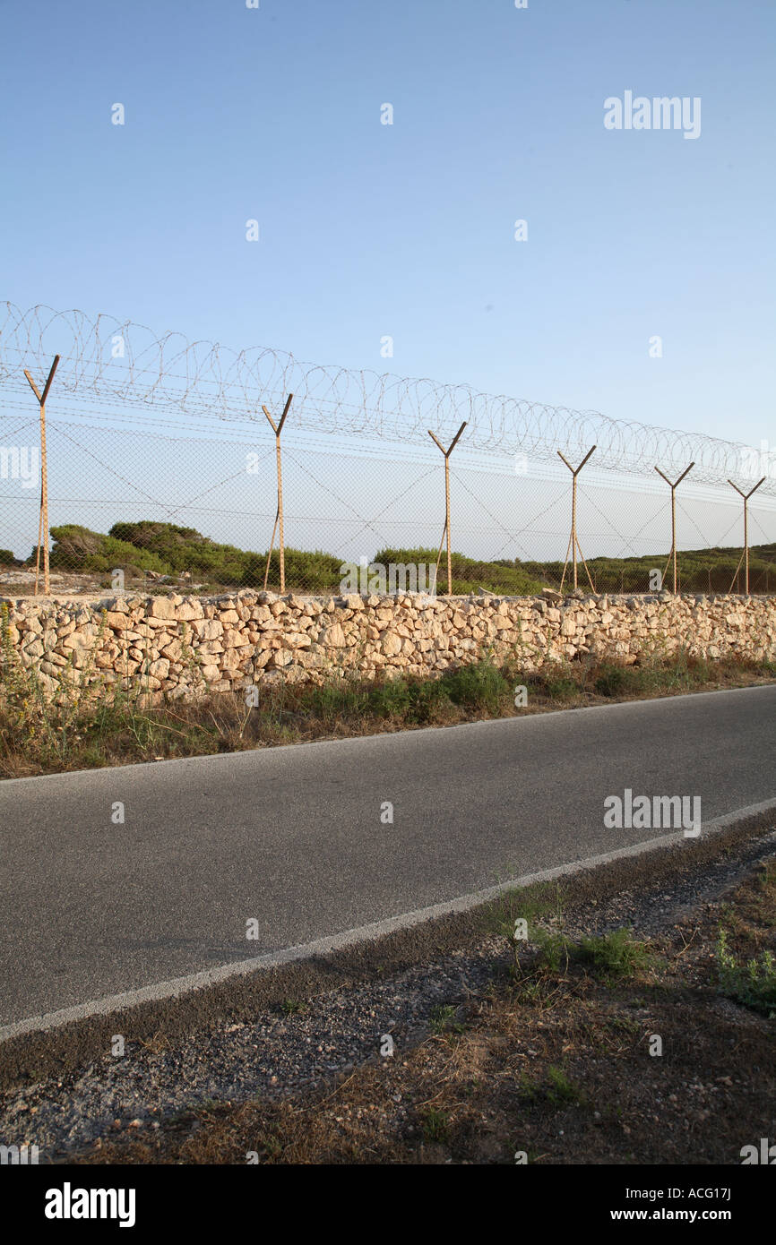 Barbed Wire Fence in a military base at Lampedusa island in Italy ...