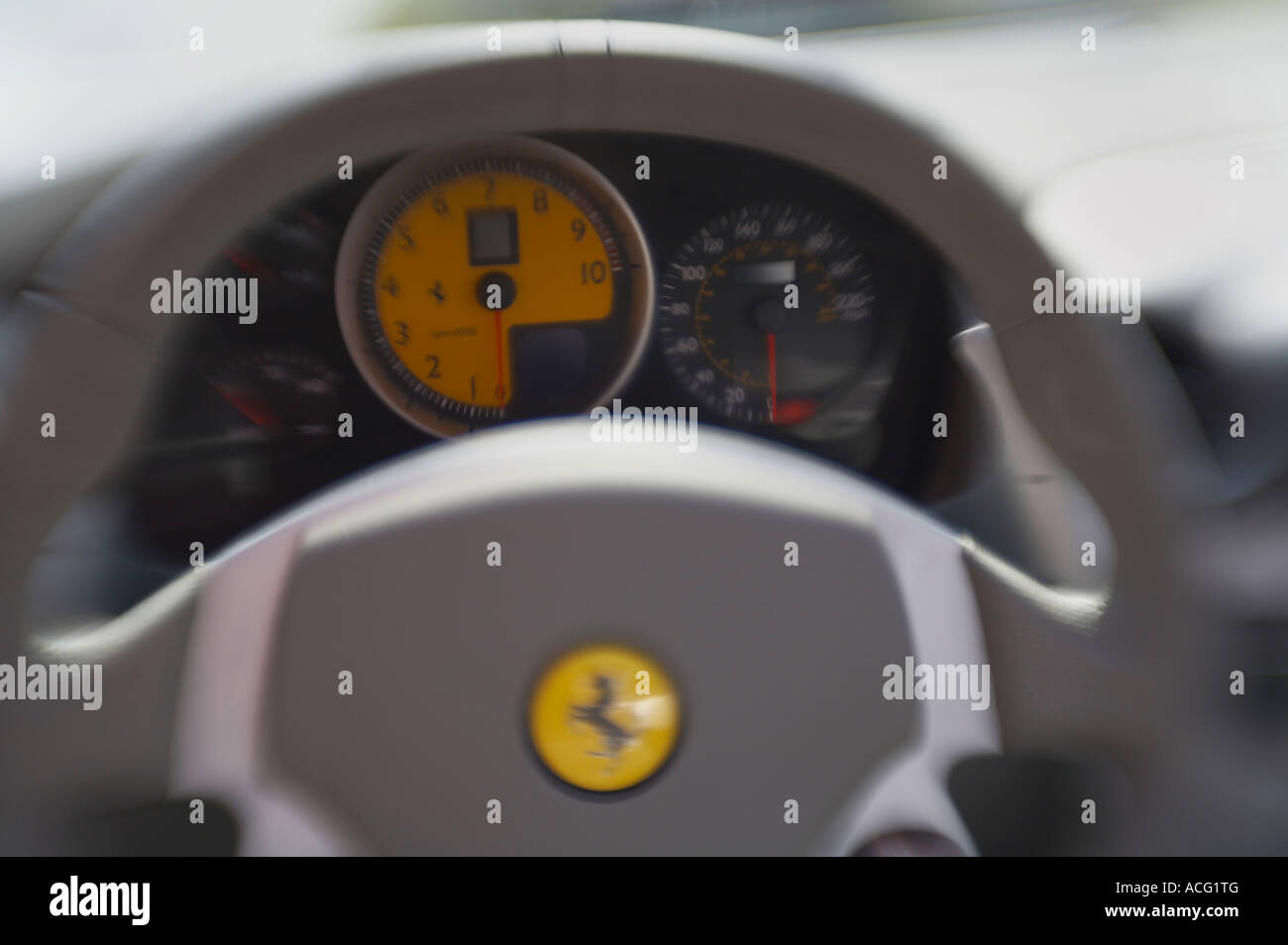 Dash and steering wheel of Italian Ferrari sports car Stock Photo - Alamy