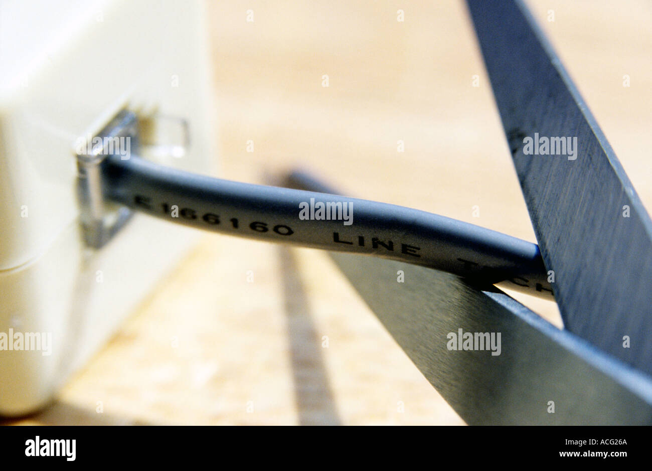 Scissors cutting telephone cord hi-res stock photography and images - Alamy