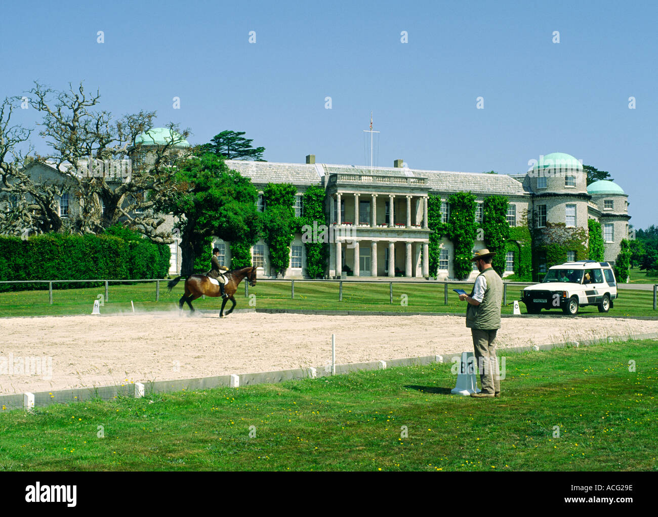 Equestrian centre riding school at Goodwood House, West Sussex, England ...