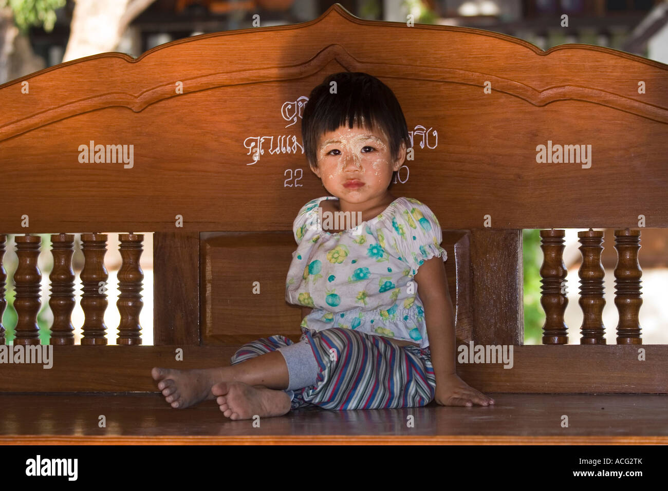 Young thai girl with traditional burmese powder on her face tanakha Mae ...