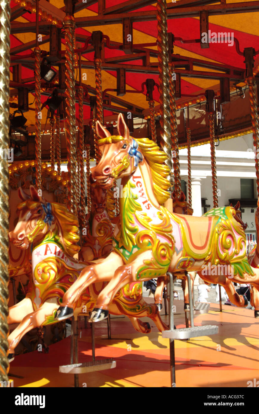 Merry go round horse ride London England Embankment Stock Photo - Alamy