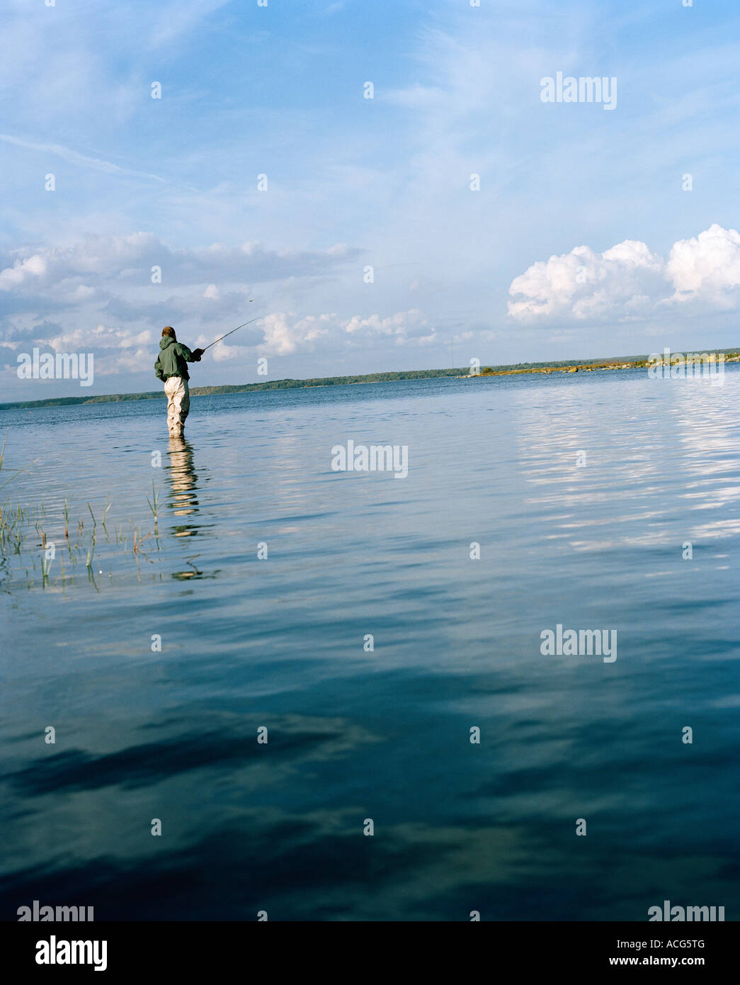 A person fishing Stock Photo - Alamy