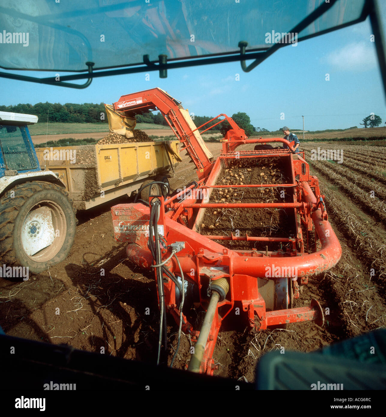 Looking back at the elevator on a Grimme potato harvester Stock Photo ...