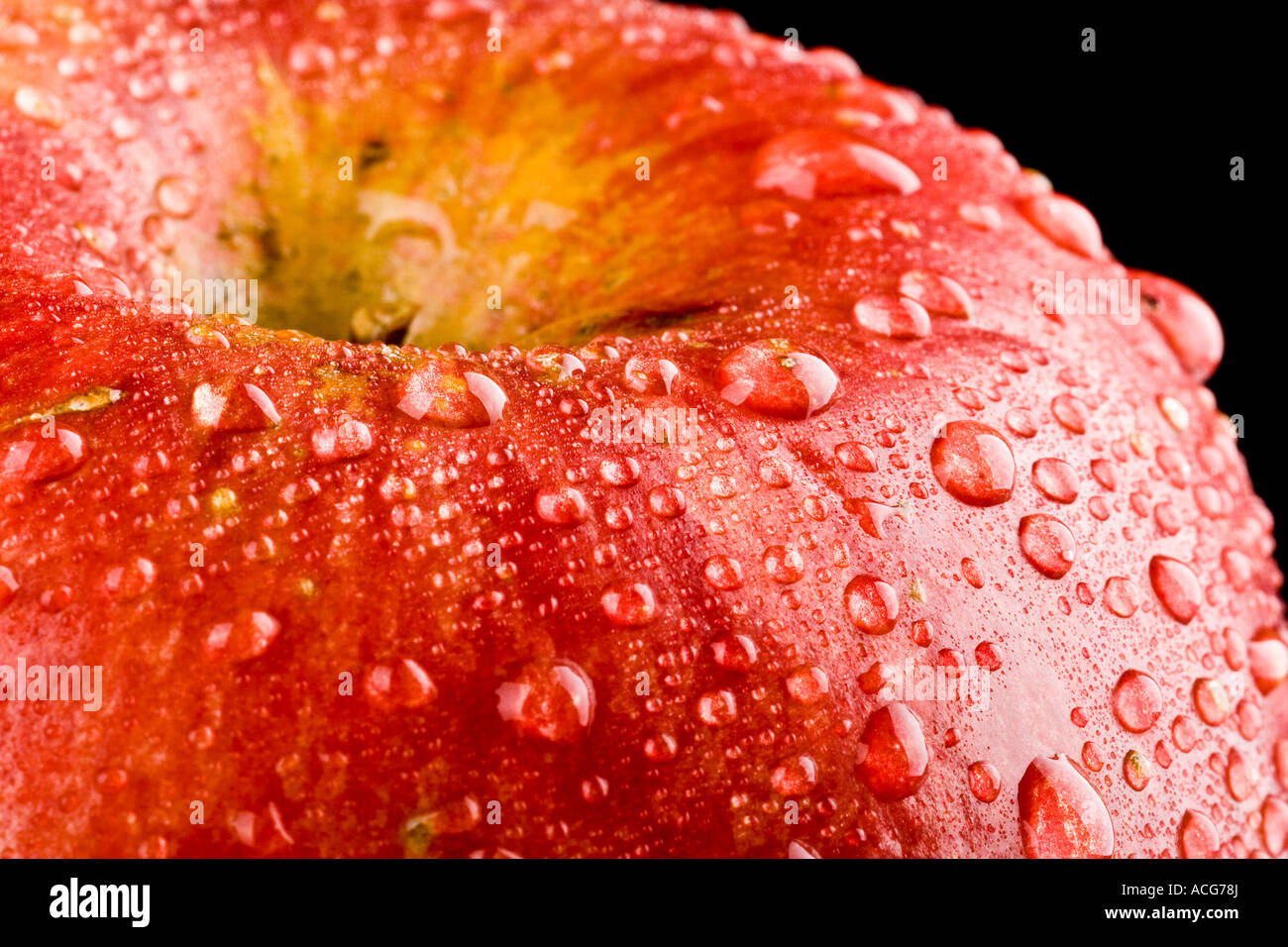 Red apple with waterdrops on black background Stock Photo - Alamy