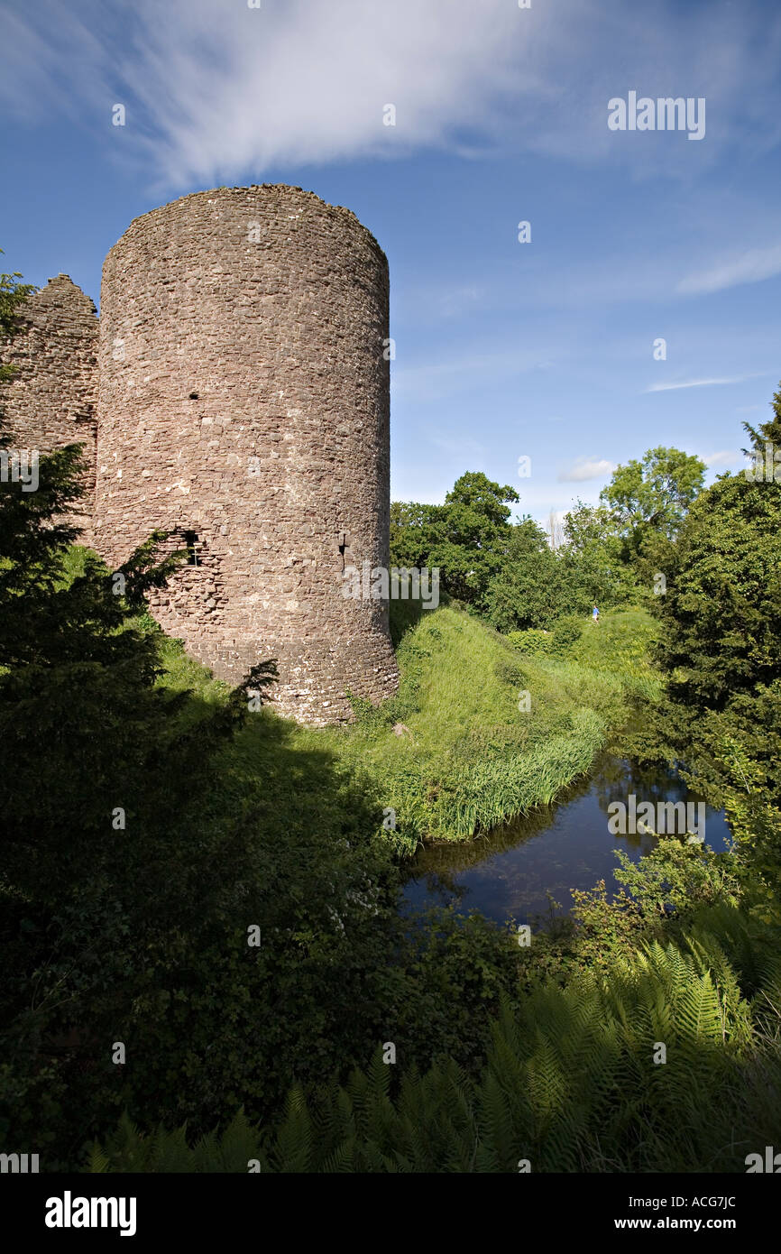 Moat and tower with female visitor White Castle Monmouthshire Wales UK ...