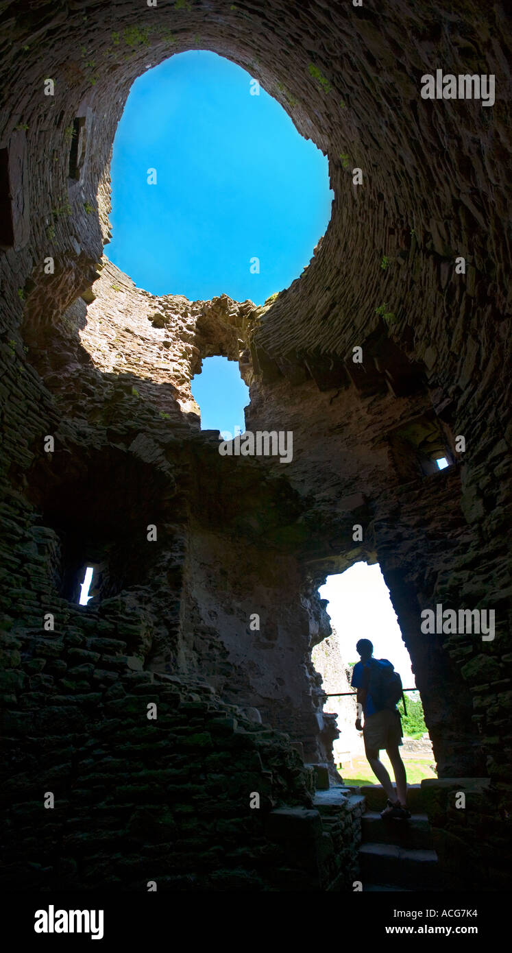Tourist standing inside ruined tower at White Castle one of the Three ...