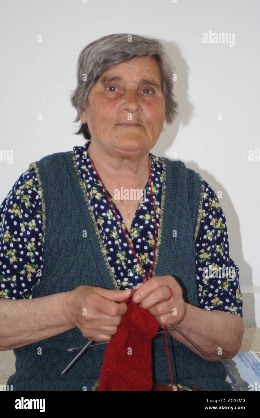 Old Woman knit a socks Stock Photo - Alamy