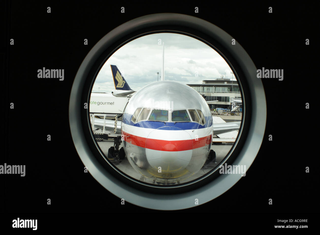 Airplane cabine view from round window Stock Photo - Alamy