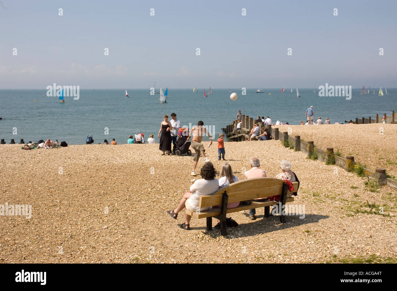 People relax on Whitstable beach, England Stock Photo - Alamy