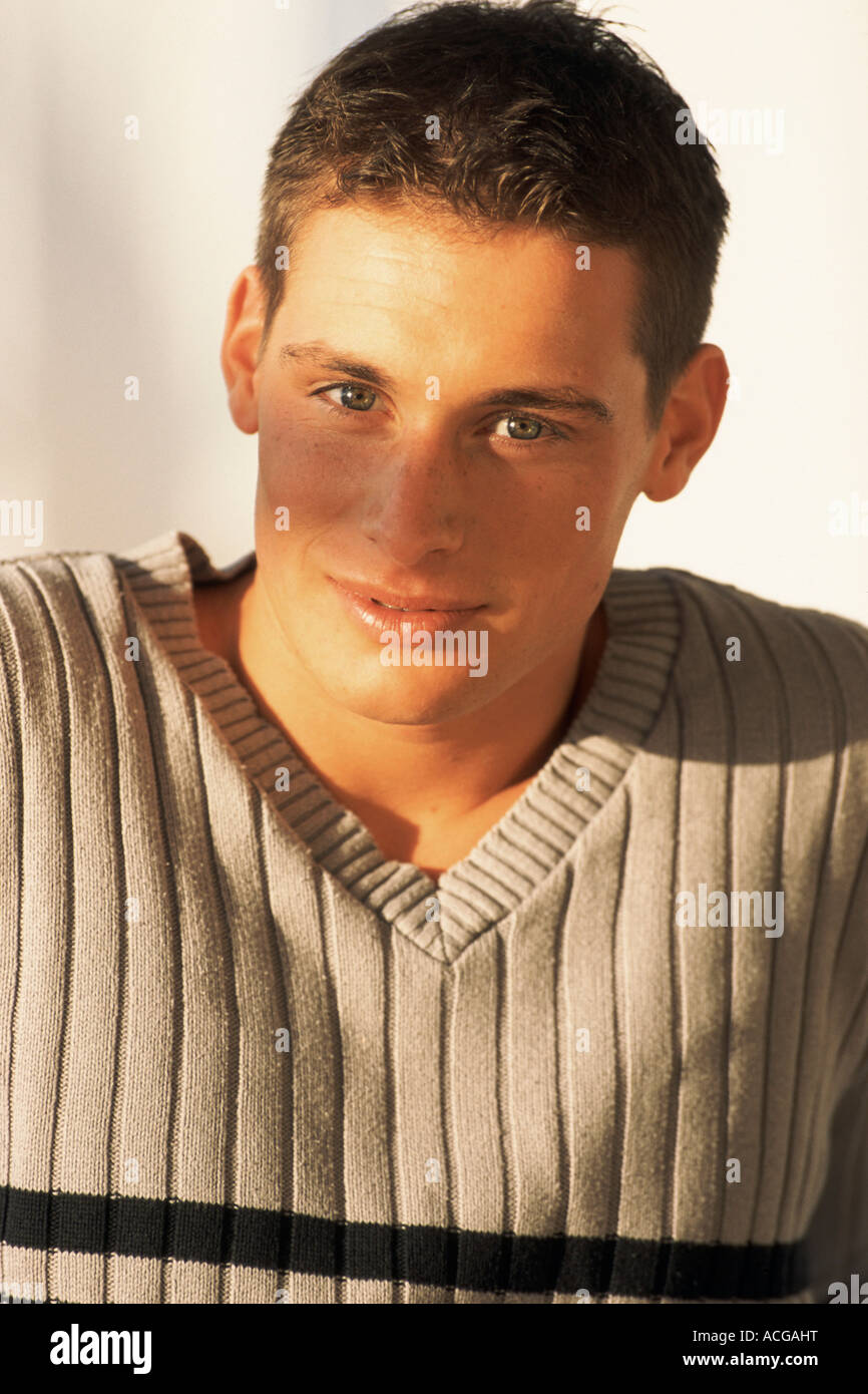 Portrait teenager posing smiling shadow on his face Stock Photo - Alamy